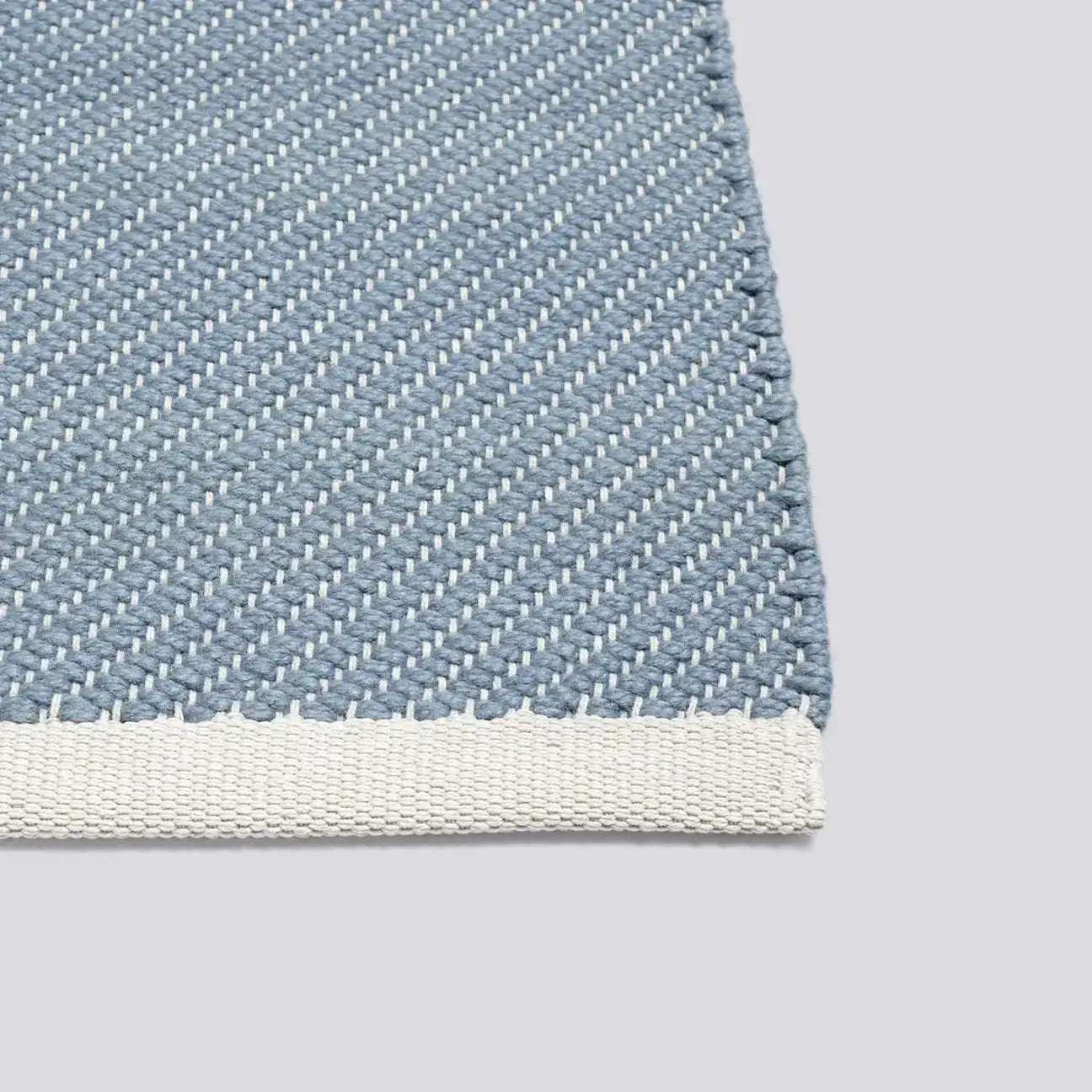 Discover HAY's Bias Rug Small Light Blue | FURNISHD.